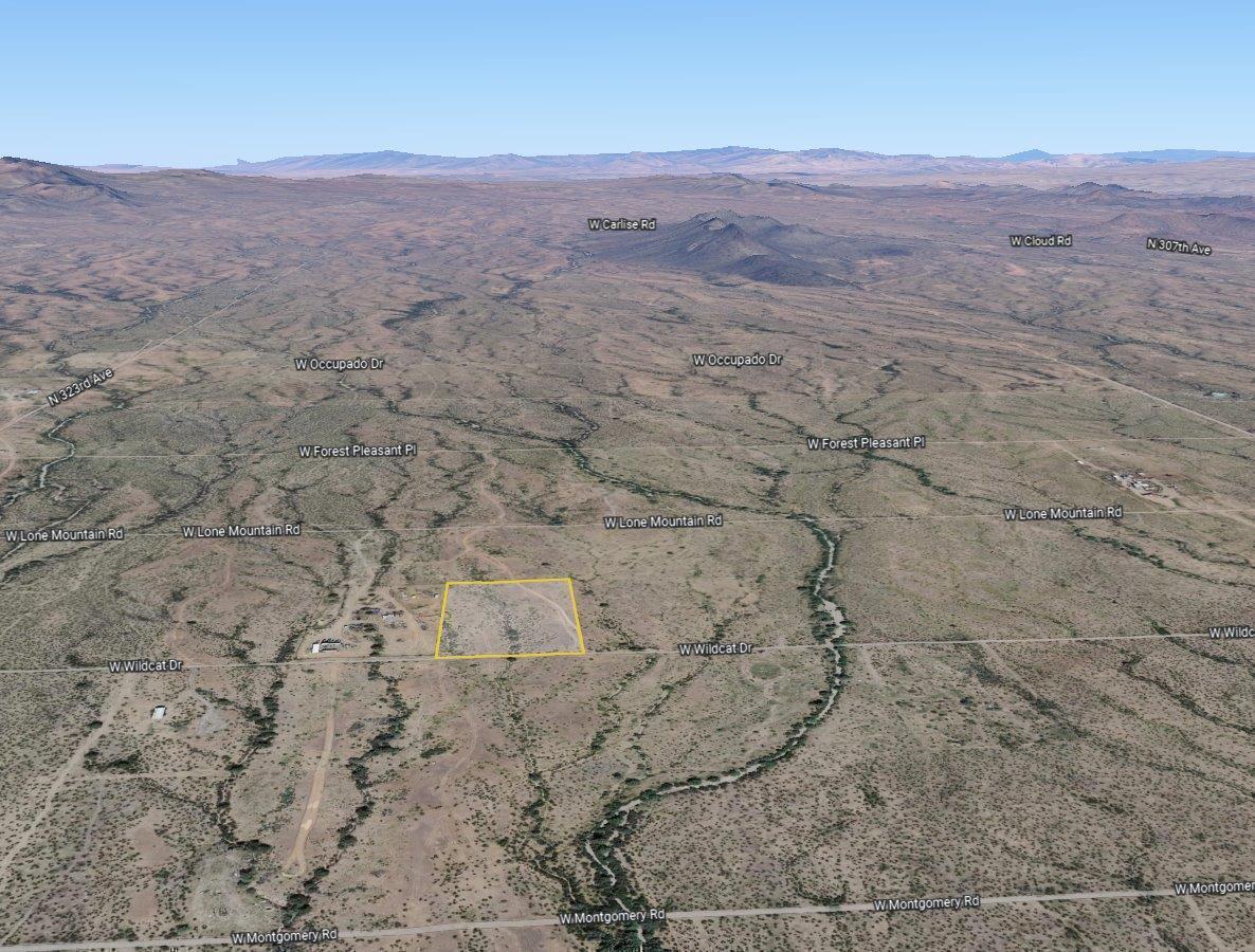 Awesome 5 acre parcel of raw land in Whispering Ranch, Whittman, AZ