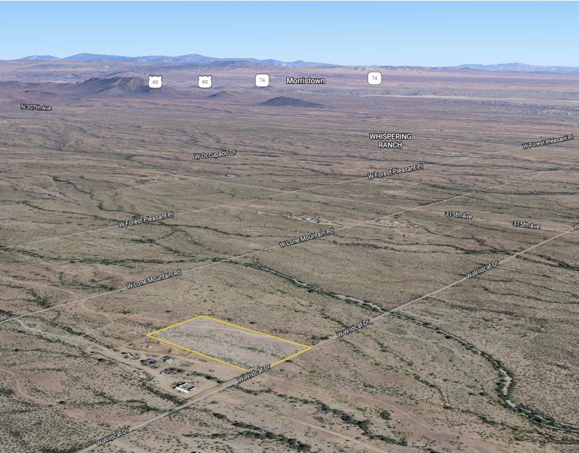 Awesome 5 acre parcel of raw land in Whispering Ranch, Whittman, AZ